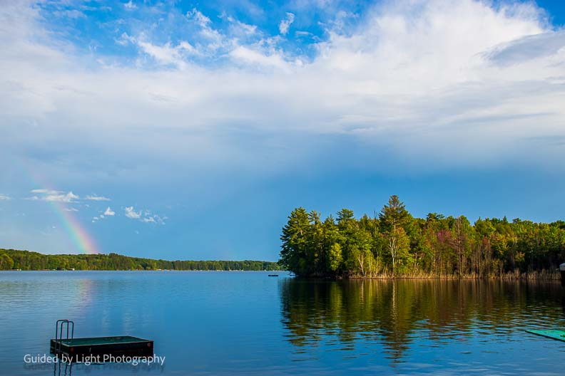 Rainbow on the Lake – Guided by Light Photography